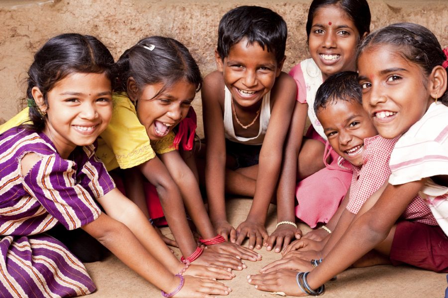 Group of Cheerful Rural Indian Children joining hands - NPOst 公益交流站